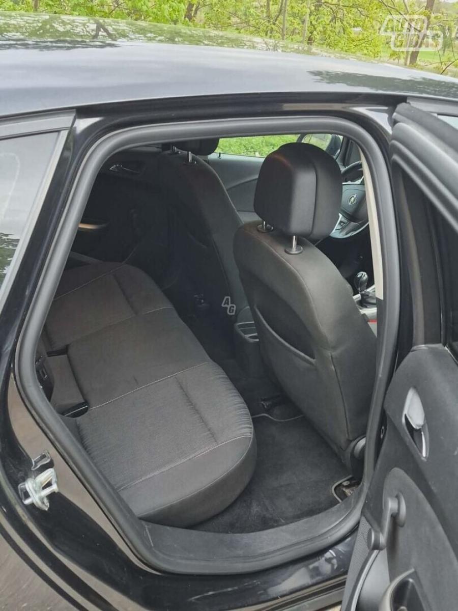 Black Opel Astra 2012 in Kaunas, with an engine capacity of 1.30 L and mileage of 188 thousand km for 3100 €, photo 11 on AUTOMOTO.COM.LV