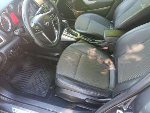 Melns Opel Astra 2012 Tauragė, ar dzinēja tilpumu 1.96 L un nobraukumu 233 tūkst. km par 3900 €, foto 14 vietnē AUTOMOTO.COM.LV