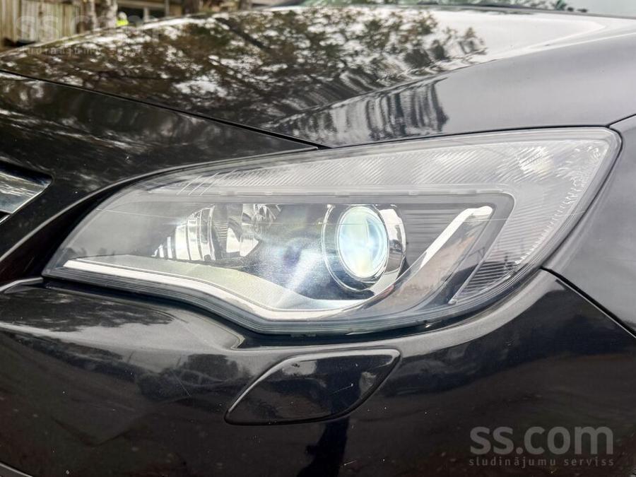 Black Opel Astra 2012 in Riga, with an engine capacity of 1.40 L and mileage of 0 thousand km for 4590 €, photo 9 on AUTOMOTO.COM.LV