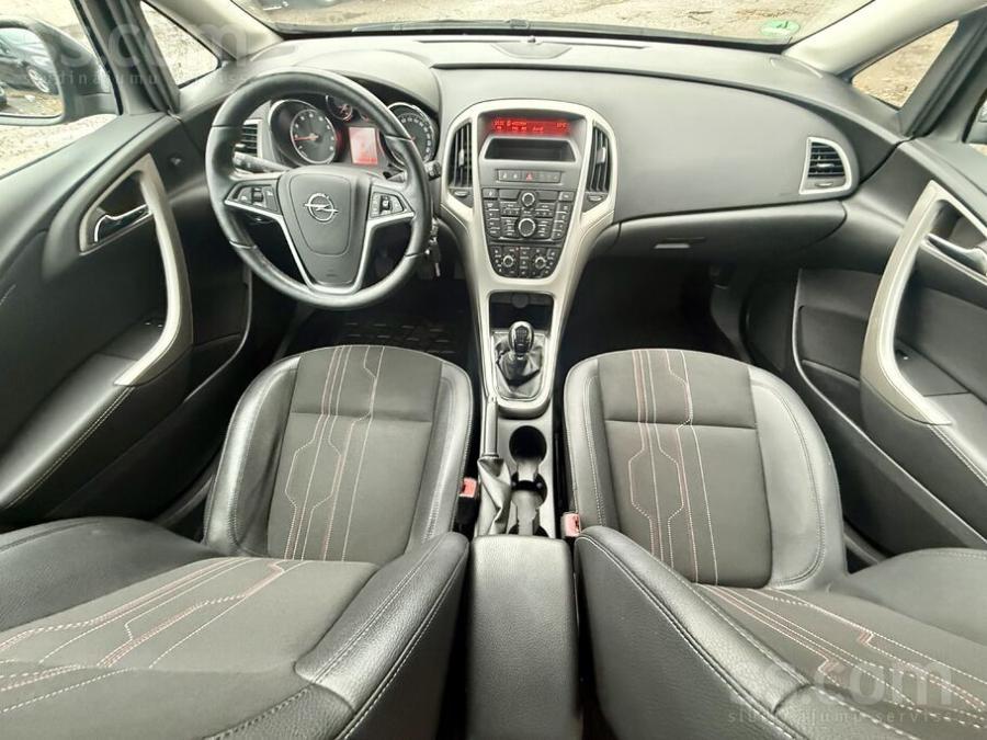 Black Opel Astra 2012 in Riga, with an engine capacity of 1.40 L and mileage of 0 thousand km for 4590 €, photo 10 on AUTOMOTO.COM.LV