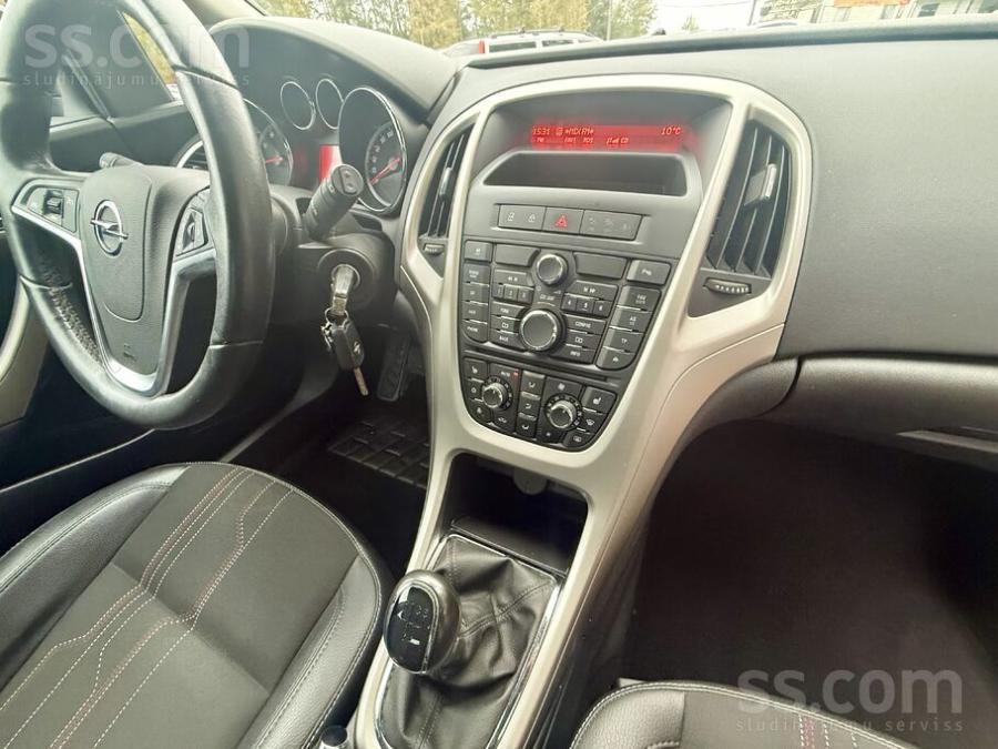Black Opel Astra 2012 in Riga, with an engine capacity of 1.40 L and mileage of 0 thousand km for 4590 €, photo 12 on AUTOMOTO.COM.LV