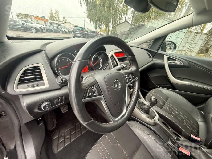 Black Opel Astra 2012 in Riga, with an engine capacity of 1.40 L and mileage of 0 thousand km for 4590 €, photo 13 on AUTOMOTO.COM.LV