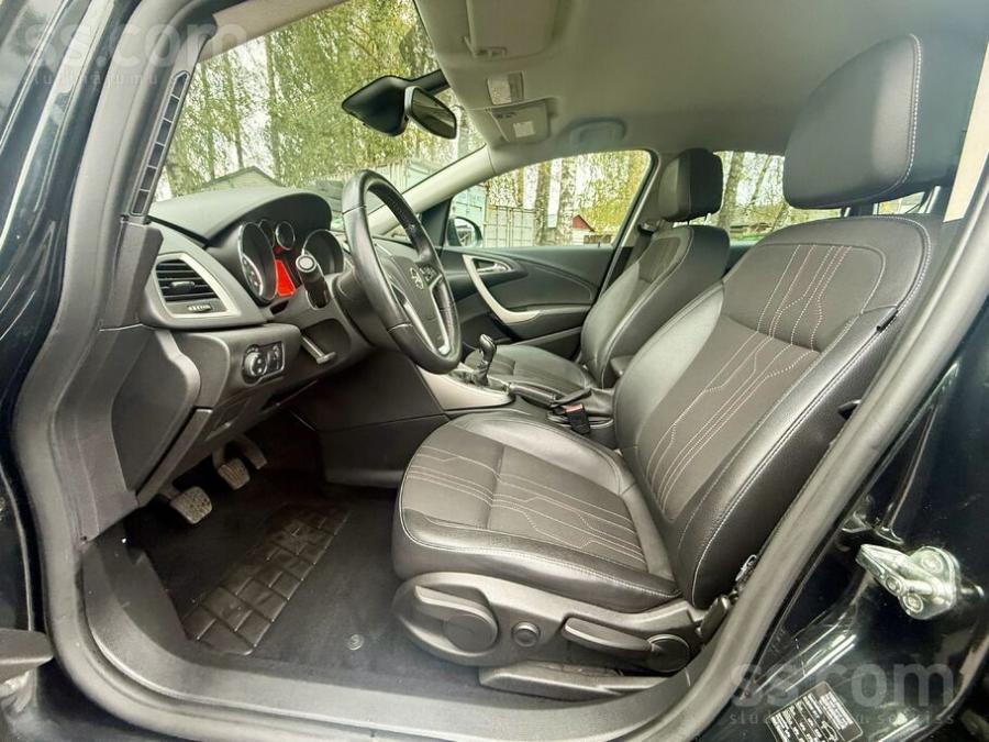 Black Opel Astra 2012 in Riga, with an engine capacity of 1.40 L and mileage of 0 thousand km for 4590 €, photo 14 on AUTOMOTO.COM.LV