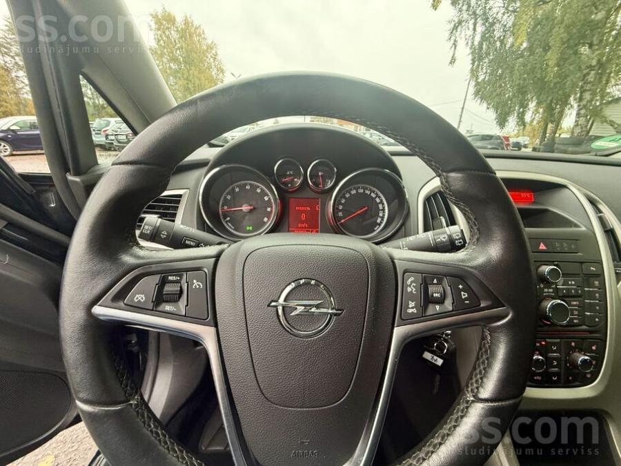 Black Opel Astra 2012 in Riga, with an engine capacity of 1.40 L and mileage of 0 thousand km for 4590 €, photo 16 on AUTOMOTO.COM.LV