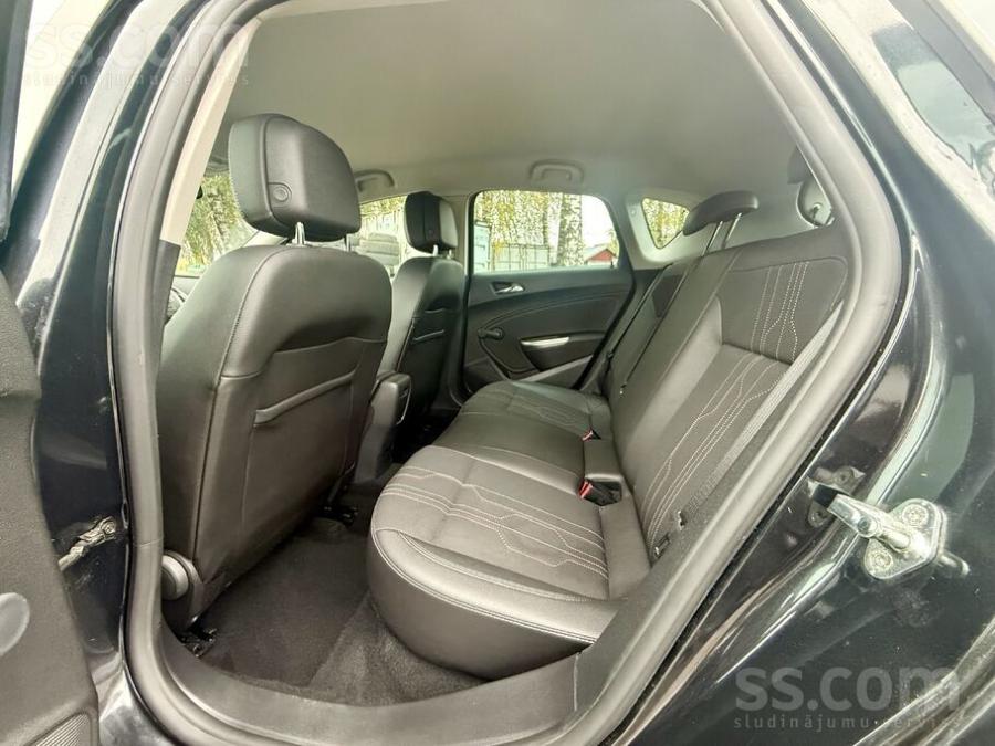 Black Opel Astra 2012 in Riga, with an engine capacity of 1.40 L and mileage of 0 thousand km for 4590 €, photo 23 on AUTOMOTO.COM.LV