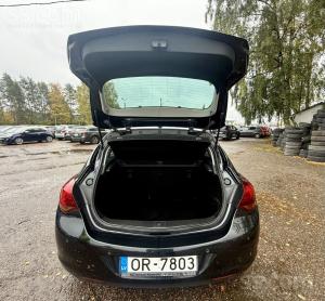 Black Opel Astra 2012 in Riga, with an engine capacity of 1.40 L and mileage of 0 thousand km for 4590 €, photo 28 on AUTOMOTO.COM.LV