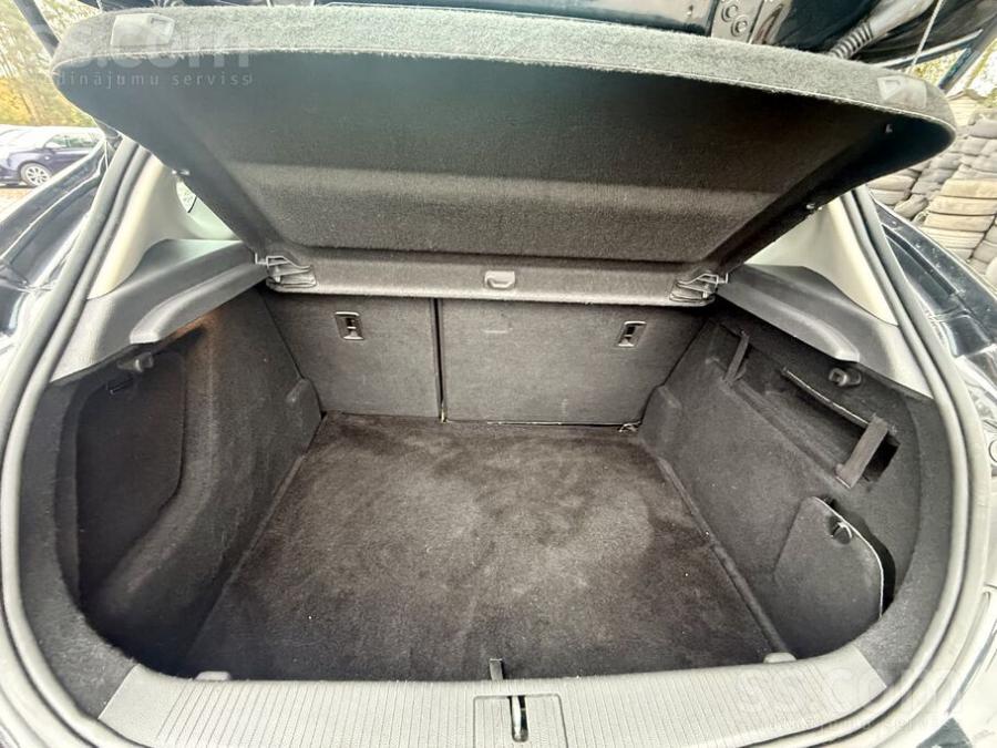 Black Opel Astra 2012 in Riga, with an engine capacity of 1.40 L and mileage of 0 thousand km for 4590 €, photo 29 on AUTOMOTO.COM.LV