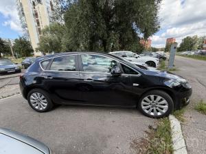 Black Opel Astra 2013 in Riga, with an engine capacity of 1.70 L and mileage of 258 thousand km for 4500 €, photo 6 on AUTOMOTO.COM.LV