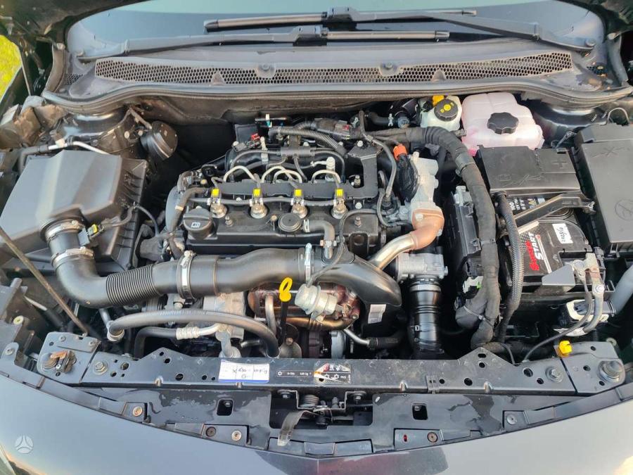 Black Opel Astra 2013 in Kelme, with an engine capacity of 1.69 L and mileage of 203 thousand km for 3900 €, photo 15 on AUTOMOTO.COM.LV