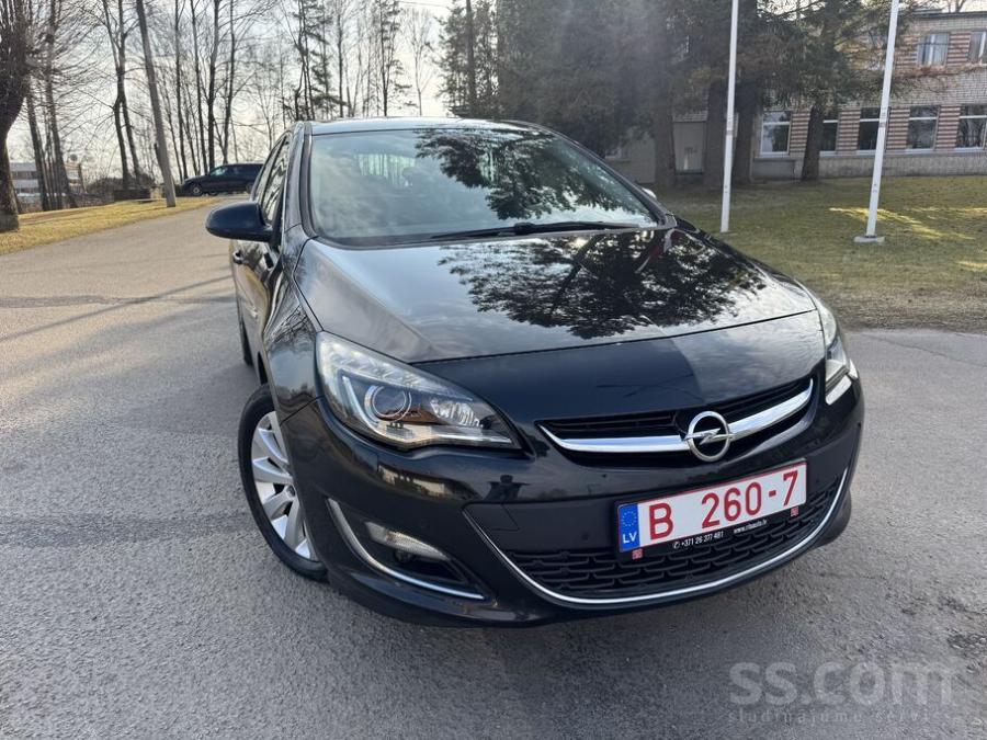 Black Opel Astra 2014 in Ogre, with an engine capacity of 2.00 L and mileage of 238 thousand km for 5250 €, photo 6 on AUTOMOTO.COM.LV
