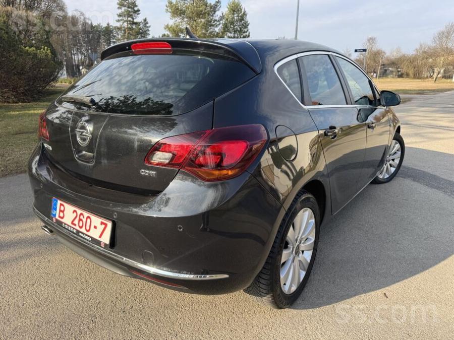 Black Opel Astra 2014 in Ogre, with an engine capacity of 2.00 L and mileage of 238 thousand km for 5250 €, photo 12 on AUTOMOTO.COM.LV