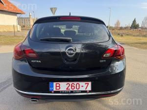 Black Opel Astra 2014 in Ogre, with an engine capacity of 2.00 L and mileage of 238 thousand km for 5250 €, photo 13 on AUTOMOTO.COM.LV