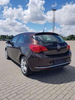 Black Opel Astra 2014 in Marijampole, with an engine capacity of 1.60 L and mileage of 188 thousand km for 4499 €, photo 6 on AUTOMOTO.COM.LV