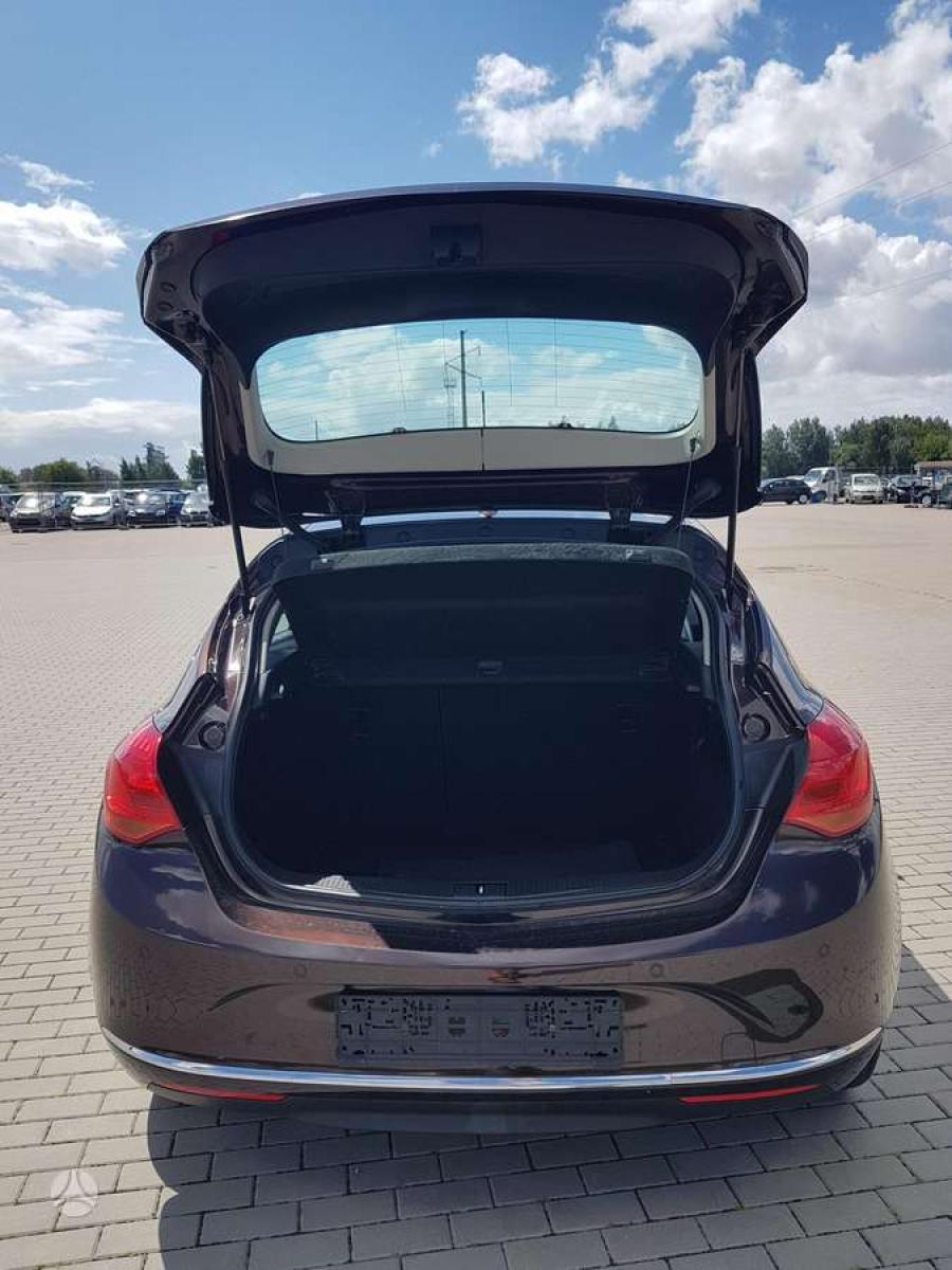 Black Opel Astra 2014 in Marijampole, with an engine capacity of 1.60 L and mileage of 188 thousand km for 4499 €, photo 7 on AUTOMOTO.COM.LV