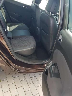 Black Opel Astra 2014 in Marijampole, with an engine capacity of 1.60 L and mileage of 188 thousand km for 4499 €, photo 12 on AUTOMOTO.COM.LV