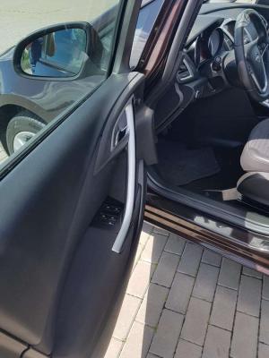 Black Opel Astra 2014 in Marijampole, with an engine capacity of 1.60 L and mileage of 188 thousand km for 4499 €, photo 16 on AUTOMOTO.COM.LV