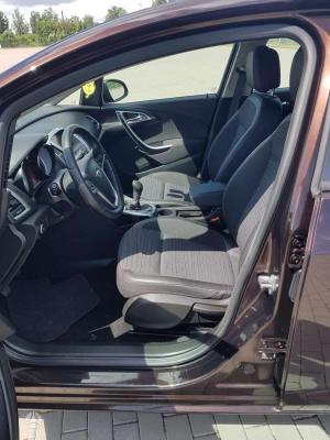Black Opel Astra 2014 in Marijampole, with an engine capacity of 1.60 L and mileage of 188 thousand km for 4499 €, photo 17 on AUTOMOTO.COM.LV