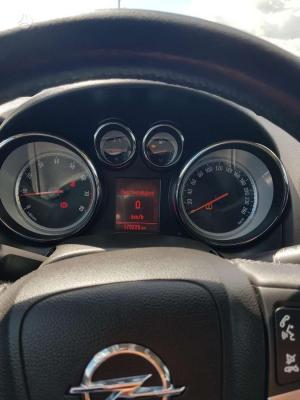 Black Opel Astra 2014 in Marijampole, with an engine capacity of 1.60 L and mileage of 188 thousand km for 4499 €, photo 18 on AUTOMOTO.COM.LV