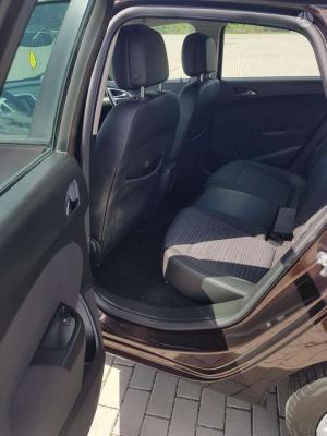 Black Opel Astra 2014 in Marijampole, with an engine capacity of 1.60 L and mileage of 188 thousand km for 4499 €, photo 19 on AUTOMOTO.COM.LV