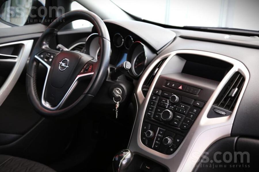 Black Opel Astra 2014 in Riga, with an engine capacity of 1.70 L and mileage of 241 thousand km for 4995 €, photo 13 on AUTOMOTO.COM.LV
