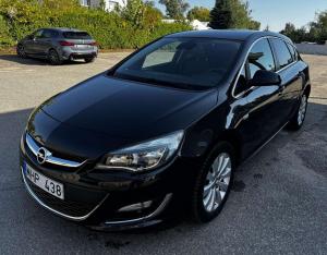 Black Opel Astra 2014 in Panevezys, with an engine capacity of 1.60 L and mileage of 185 thousand km for 5100 €, photo  on AUTOMOTO.COM.LV