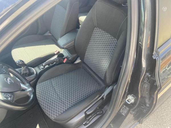 Black Opel Astra 2016 in Klaipeda, with an engine capacity of 1.60 L and mileage of 224 thousand km for 4849 €, photo 10 on AUTOMOTO.COM.LV