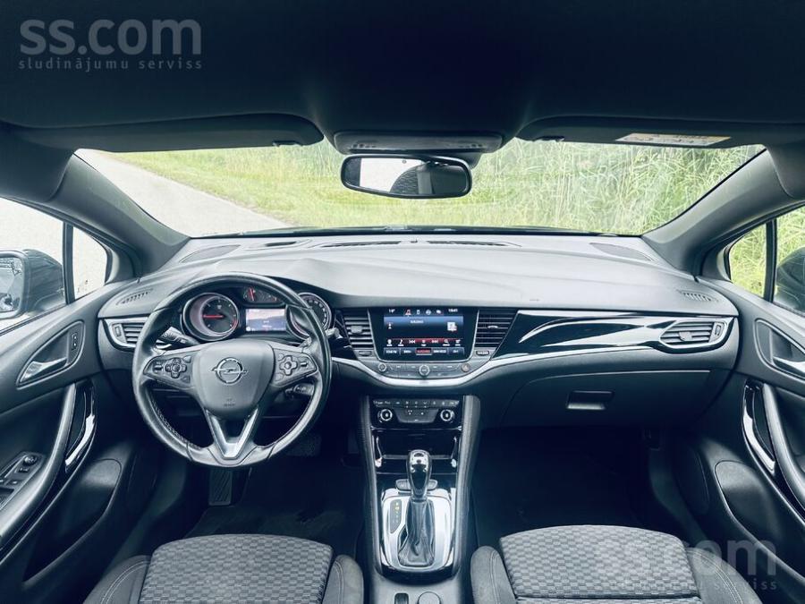 Black Opel Astra 2016 in Tukums, with an engine capacity of 1.60 L and mileage of 265 thousand km for 5700 €, photo 6 on AUTOMOTO.COM.LV