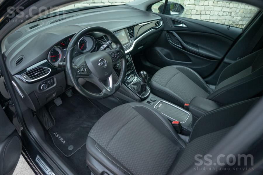 Melns Opel Astra 2016 Liepāja, ar dzinēja tilpumu 1.60 L un nobraukumu 333 tūkst. km par 6500 €, foto 12 vietnē AUTOMOTO.COM.LV