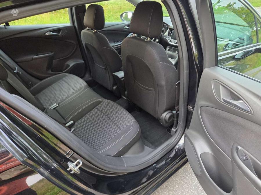 Black Opel Astra 2017 in Kaunas, with an engine capacity of 1.60 L and mileage of 260 thousand km for 5989 €, photo 12 on AUTOMOTO.COM.LV