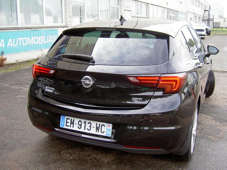 Black Opel Astra 2017 in Vilnius, with an engine capacity of 1.60 L and mileage of 191 thousand km for 7599 €, photo 12 on AUTOMOTO.COM.LV
