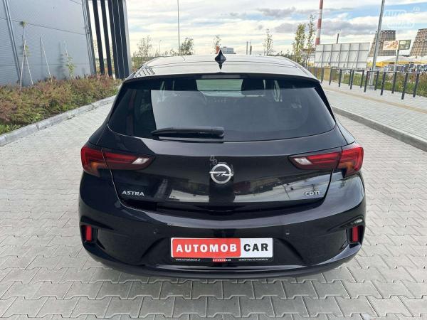 Black Opel Astra 2018 in Vilnius, with an engine capacity of 1.60 L and mileage of 216 thousand km for 8950 €, photo 7 on AUTOMOTO.COM.LV