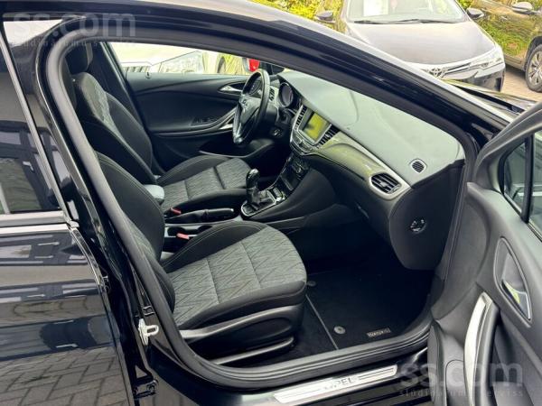 Black Opel Astra 2020 in Riga, with an engine capacity of 1.50 L and mileage of 185 thousand km for 8200 €, photo 6 on AUTOMOTO.COM.LV