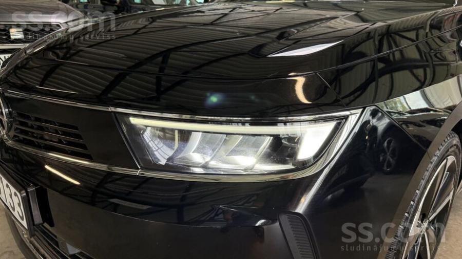 Black Opel Astra 2022 in Riga, with an engine capacity of 1.60 L and mileage of 76 thousand km for 18900 €, photo 9 on AUTOMOTO.COM.LV