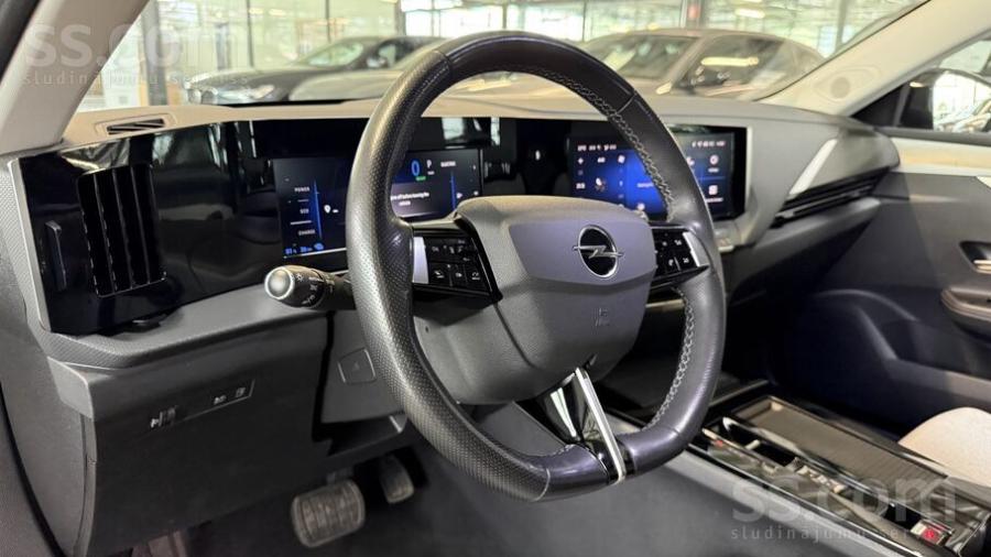 Black Opel Astra 2022 in Riga, with an engine capacity of 1.60 L and mileage of 76 thousand km for 18900 €, photo 18 on AUTOMOTO.COM.LV