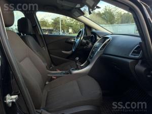Black Opel Astra 2011 in Riga, with an engine capacity of 1.70 L and mileage of 0 thousand km for 949 €, photo 7 on AUTOMOTO.COM.LV