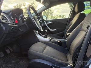 Black Opel Astra 2011 in Riga, with an engine capacity of 1.70 L and mileage of 0 thousand km for 949 €, photo 8 on AUTOMOTO.COM.LV