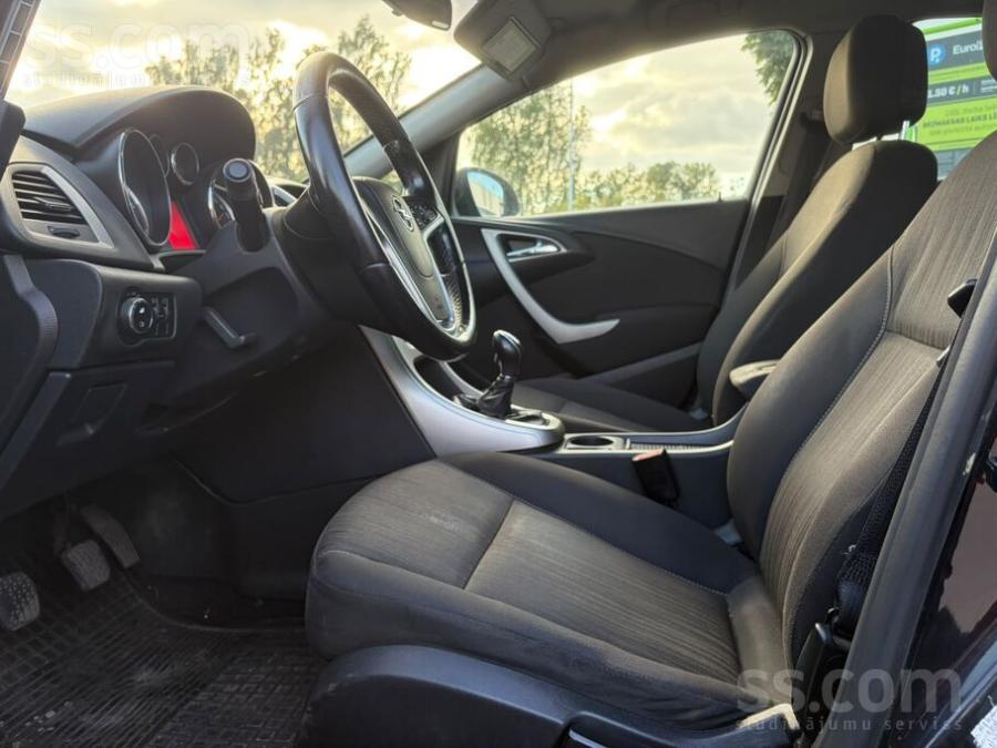 Black Opel Astra 2011 in Riga, with an engine capacity of 1.70 L and mileage of 0 thousand km for 949 €, photo 8 on AUTOMOTO.COM.LV