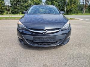 Black Opel Astra 2015 in Ogre, with an engine capacity of 2.00 L and mileage of 202 thousand km for 5750 €, photo 6 on AUTOMOTO.COM.LV