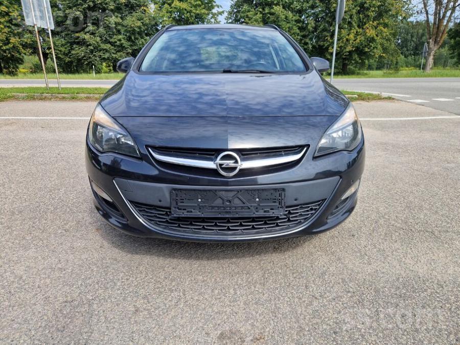 Black Opel Astra 2015 in Ogre, with an engine capacity of 2.00 L and mileage of 202 thousand km for 5750 €, photo 6 on AUTOMOTO.COM.LV