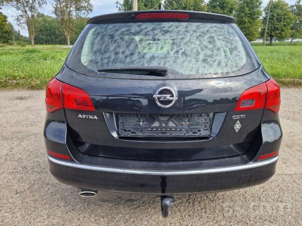Melns Opel Astra 2015 Ogre, ar dzinēja tilpumu 2.00 L un nobraukumu 202 tūkst. km par 5750 €, foto 6 vietnē AUTOMOTO.COM.LV