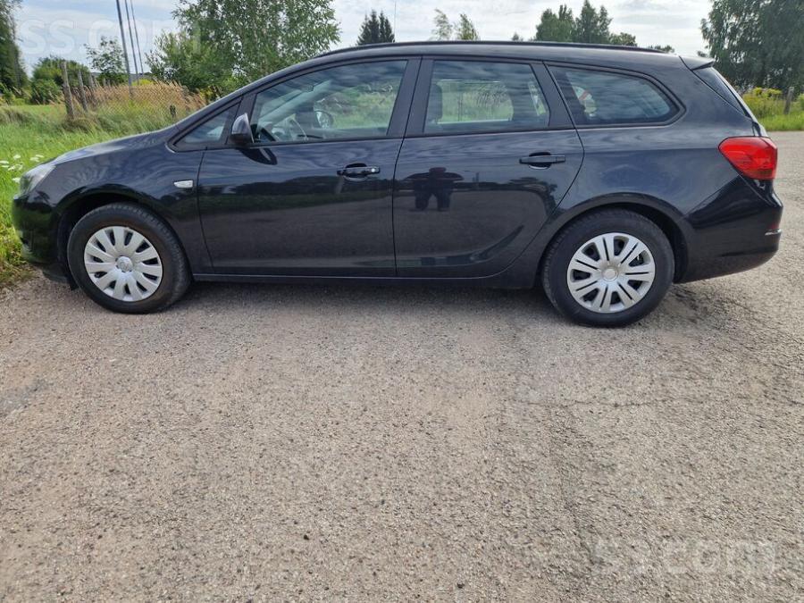 Black Opel Astra 2015 in Ogre, with an engine capacity of 2.00 L and mileage of 202 thousand km for 5750 €, photo 8 on AUTOMOTO.COM.LV