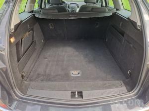 Black Opel Astra 2015 in Ogre, with an engine capacity of 2.00 L and mileage of 202 thousand km for 5750 €, photo 9 on AUTOMOTO.COM.LV