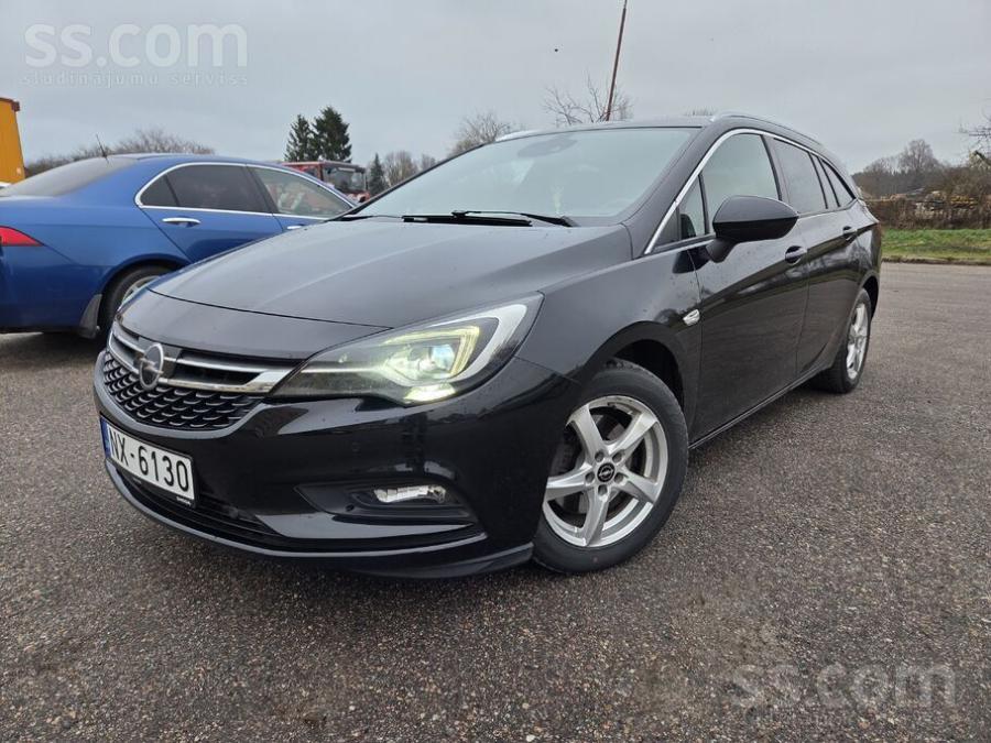 Black Opel Astra 2019 in Riga, with an engine capacity of 2.00 L and mileage of 190 thousand km for 9500 €, photo 6 on AUTOMOTO.COM.LV