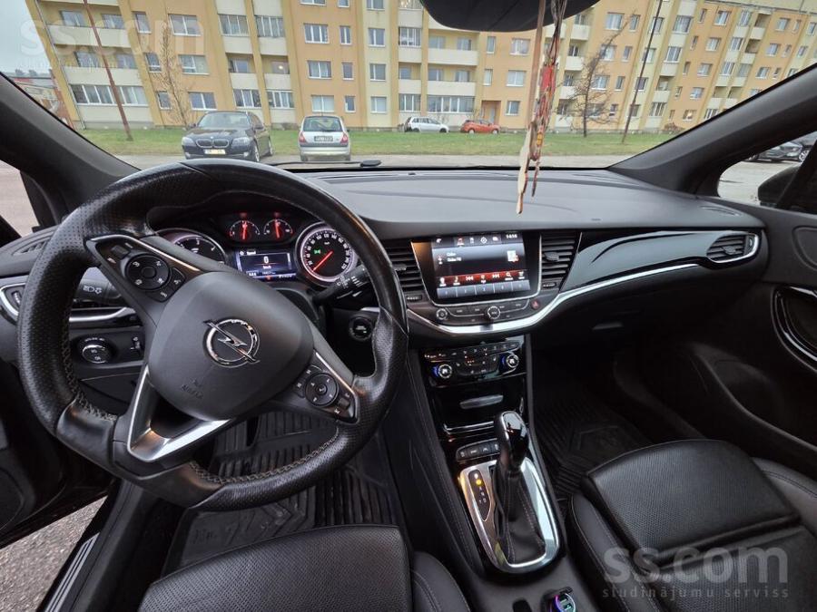 Black Opel Astra 2019 in Riga, with an engine capacity of 2.00 L and mileage of 190 thousand km for 9500 €, photo 13 on AUTOMOTO.COM.LV