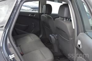 Black Opel Astra 2013 in Tukums, with an engine capacity of 1.60 L and mileage of 133 thousand km for 5595 €, photo 11 on AUTOMOTO.COM.LV