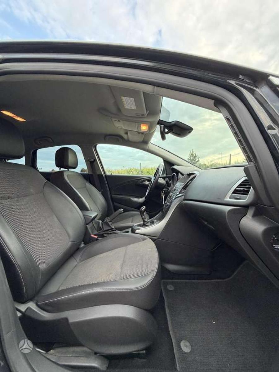 Melns Opel Astra 2014 Tauragė, ar dzinēja tilpumu 1.69 L un nobraukumu 208 tūkst. km par 3600 €, foto 35 vietnē AUTOMOTO.COM.LV