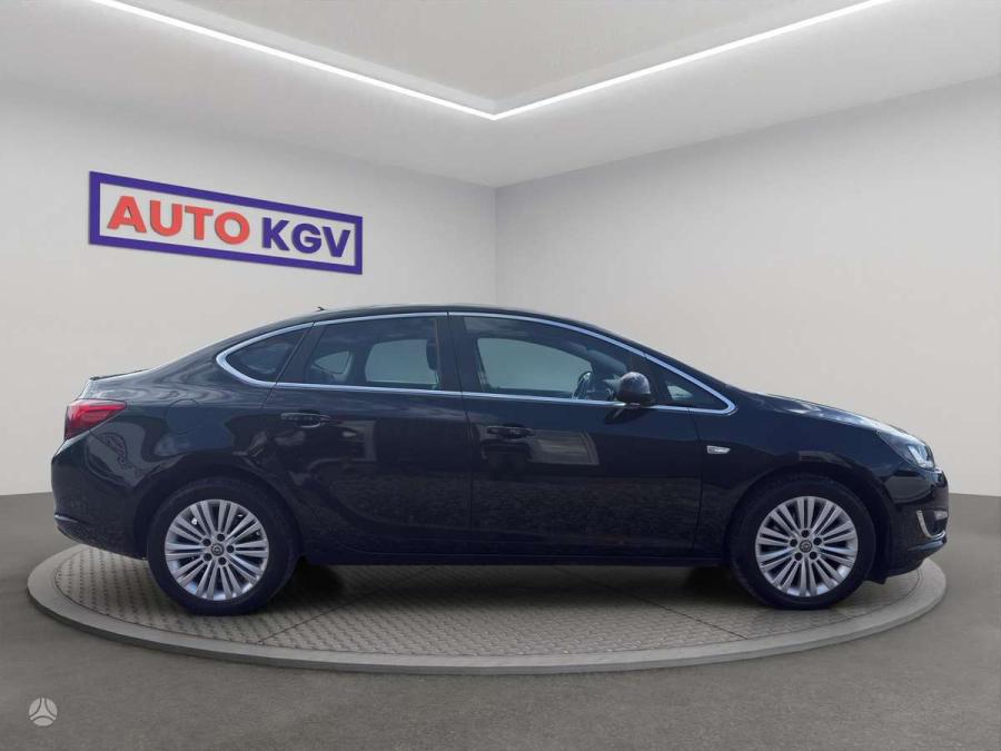 Black Opel Astra 2015 in Kaunas, with an engine capacity of 1.60 L and mileage of 276 thousand km for 5499 €, photo 7 on AUTOMOTO.COM.LV