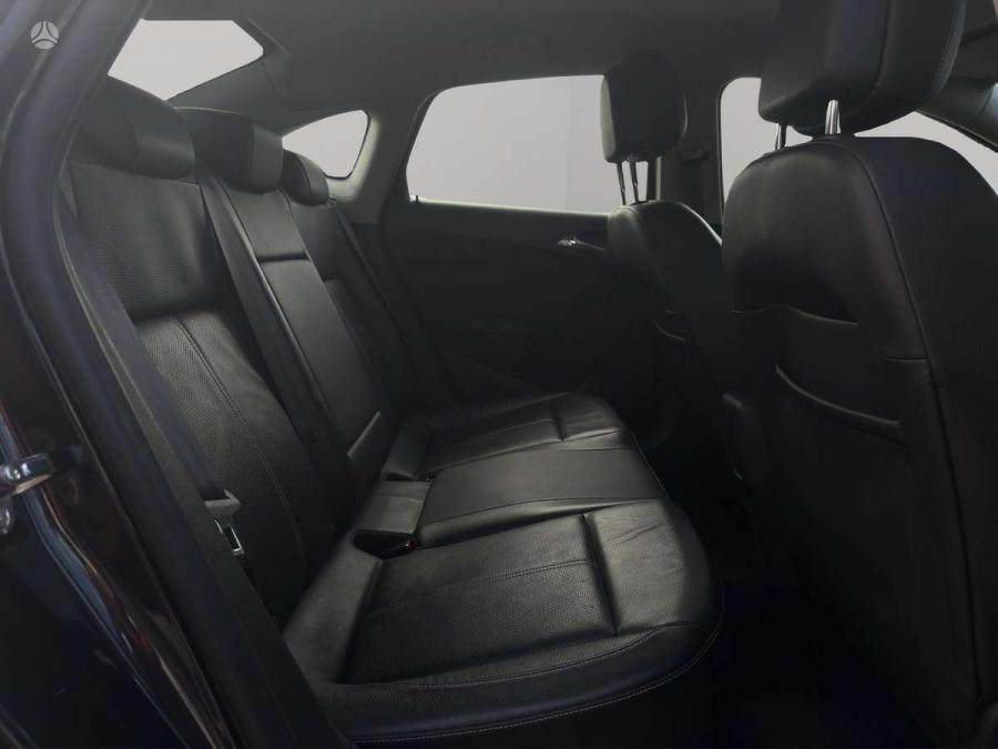 Black Opel Astra 2015 in Kaunas, with an engine capacity of 1.60 L and mileage of 276 thousand km for 5499 €, photo 10 on AUTOMOTO.COM.LV