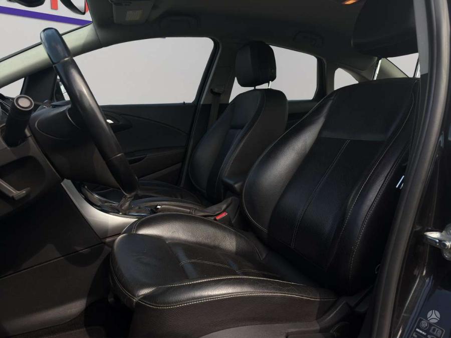 Black Opel Astra 2015 in Kaunas, with an engine capacity of 1.60 L and mileage of 276 thousand km for 5499 €, photo 15 on AUTOMOTO.COM.LV