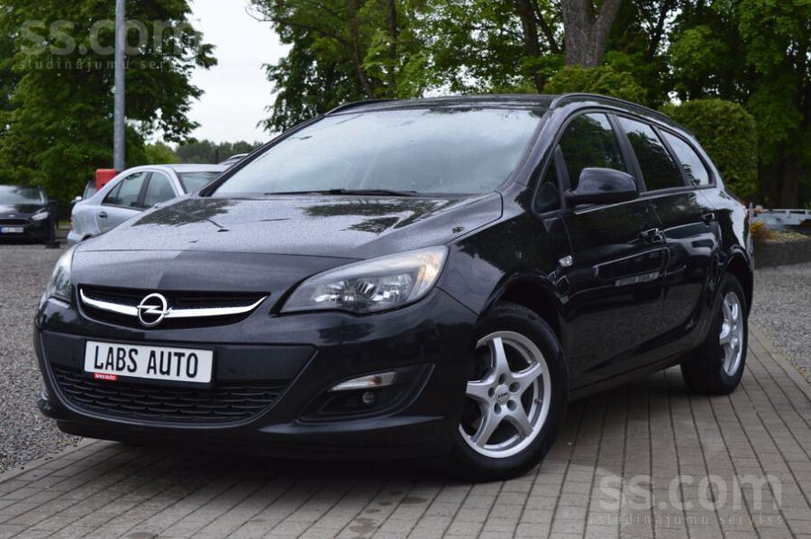 Black Opel Astra 2016 in Tukums, with an engine capacity of 1.40 L and mileage of 199 thousand km for 5595 €, photo 1 on AUTOMOTO.COM.LV